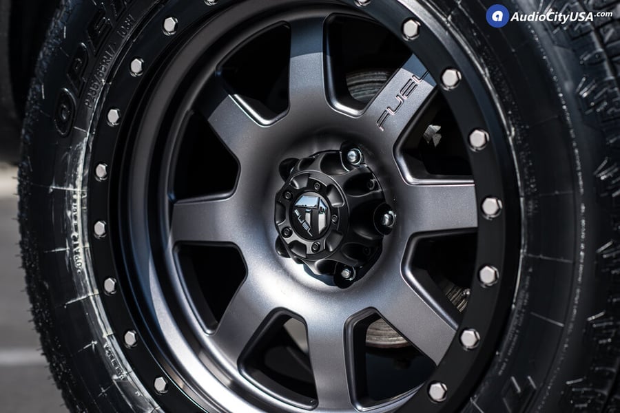 17″ Fuel Wheels D552 Trophy with Gunmetal Rims and 235-65-17 Toyo Open ...